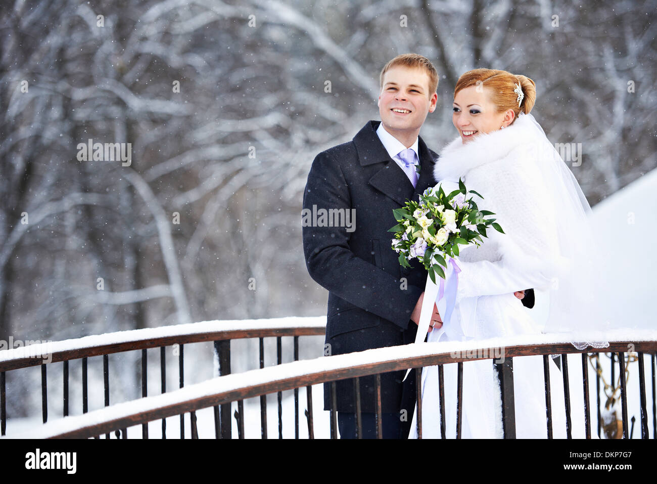 Happy bride and groom on winter wedding day Stock Photo - Alamy