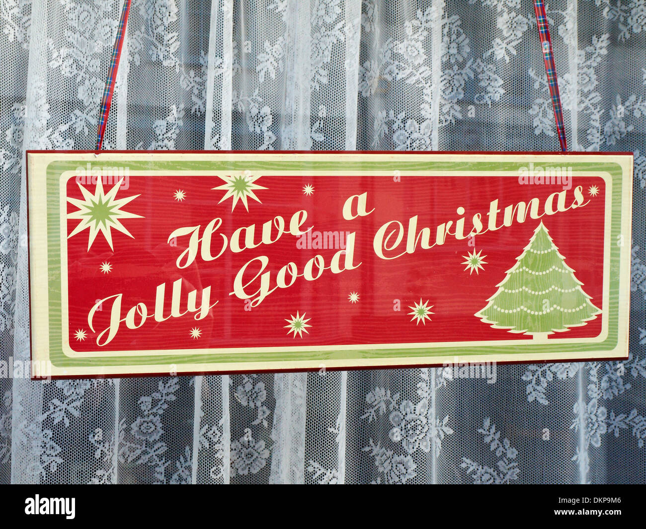 Have a jolly good Christmas sign in shop window UK Stock Photo - Alamy