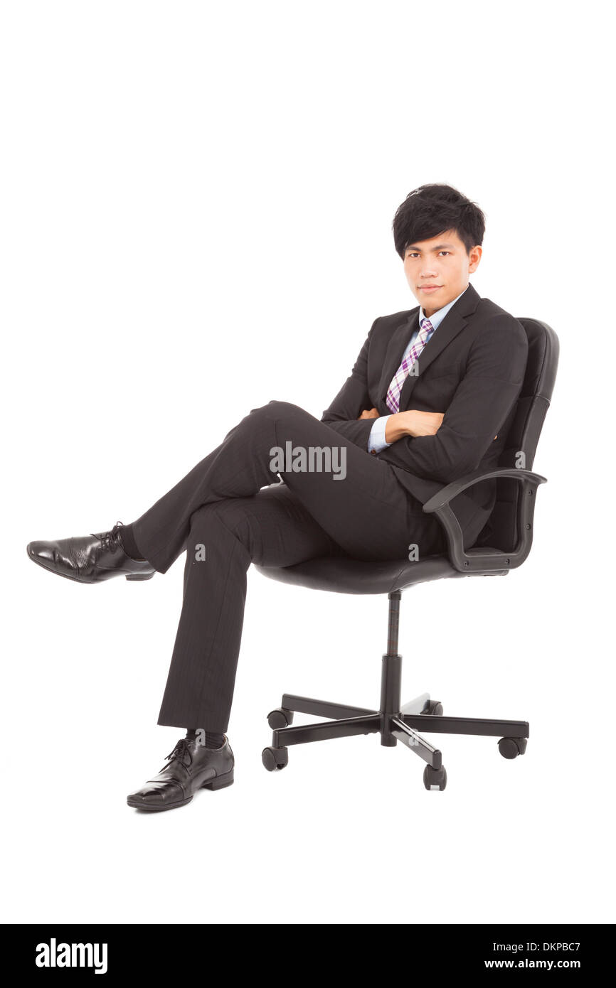 Man sitting in chair full length Cut Out Stock Images & Pictures - Alamy