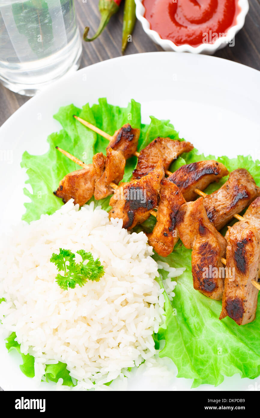 Grilled marinated pork with rice Stock Photo - Alamy