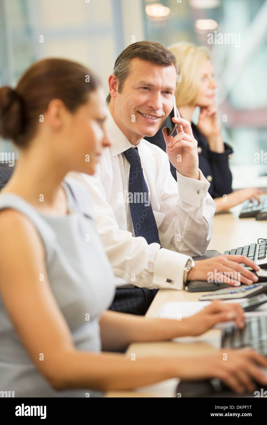 Use mobile phone in meeting hi-res stock photography and images - Alamy