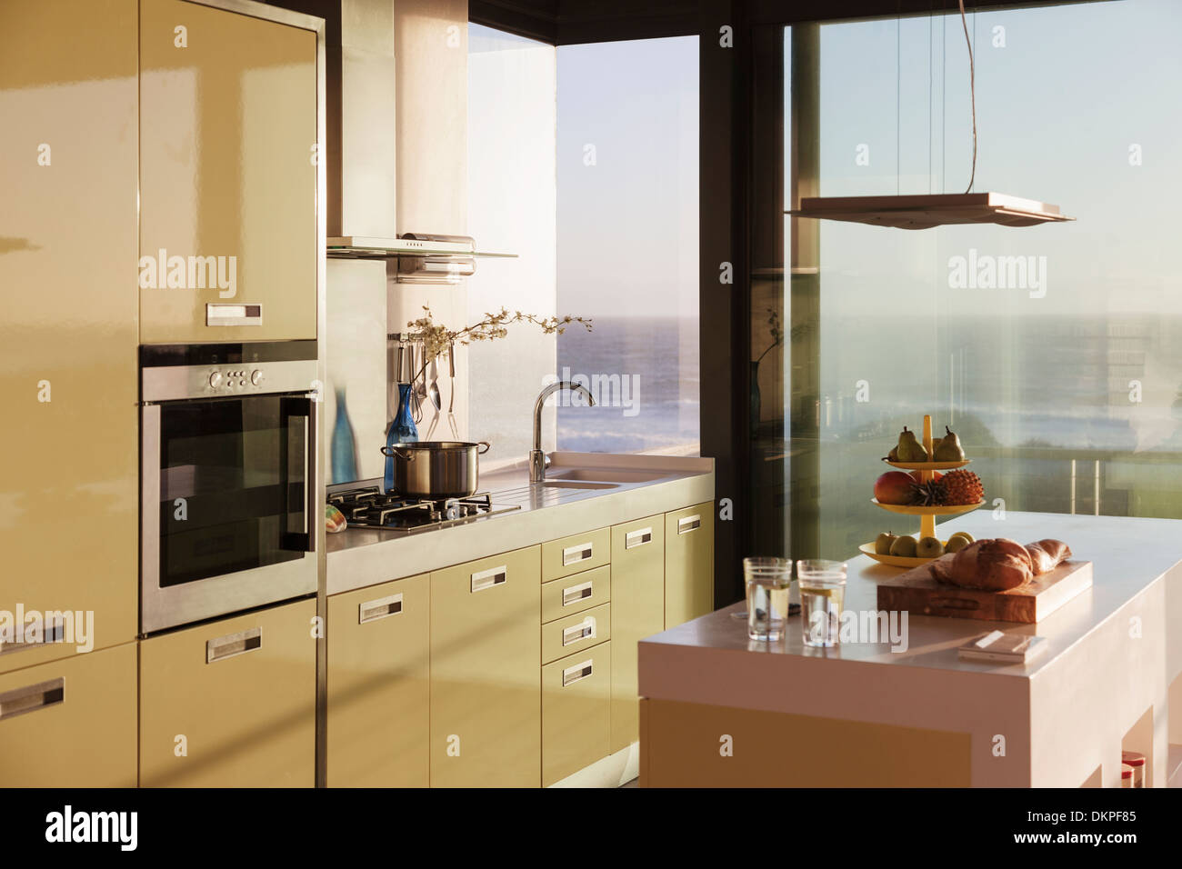 Modern kitchen overlooking ocean Stock Photo - Alamy