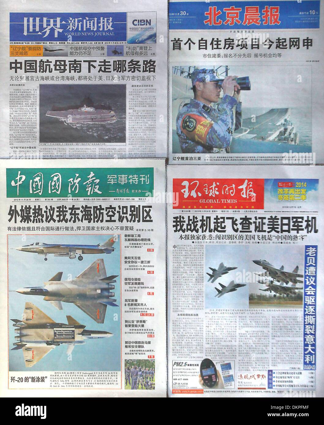 Beijing, CHINA, China. 30th Nov, 2013. Chinese newspapers feature front ...