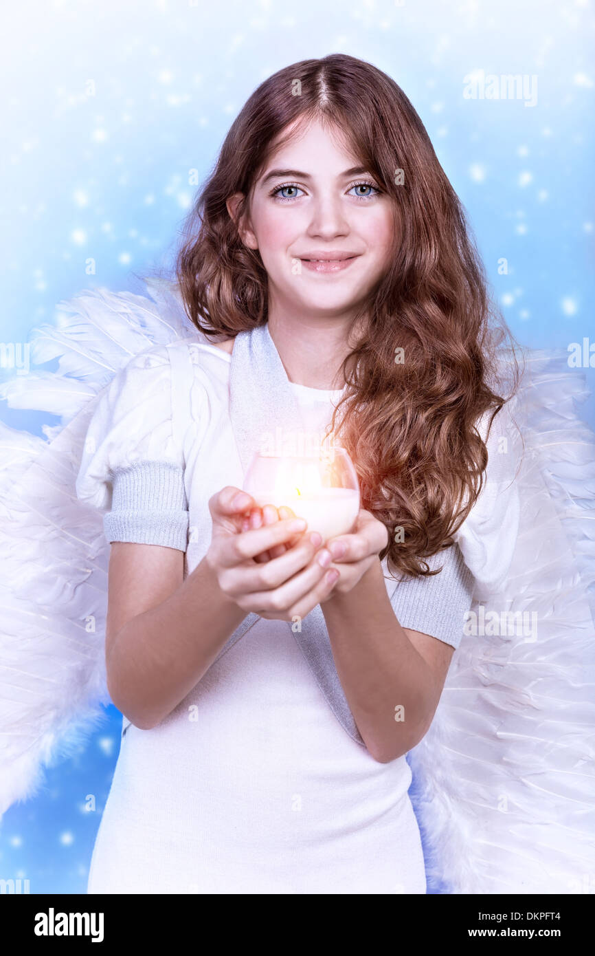 Portrait of sweet angel, beautiful teen girl with dark curly hair ...