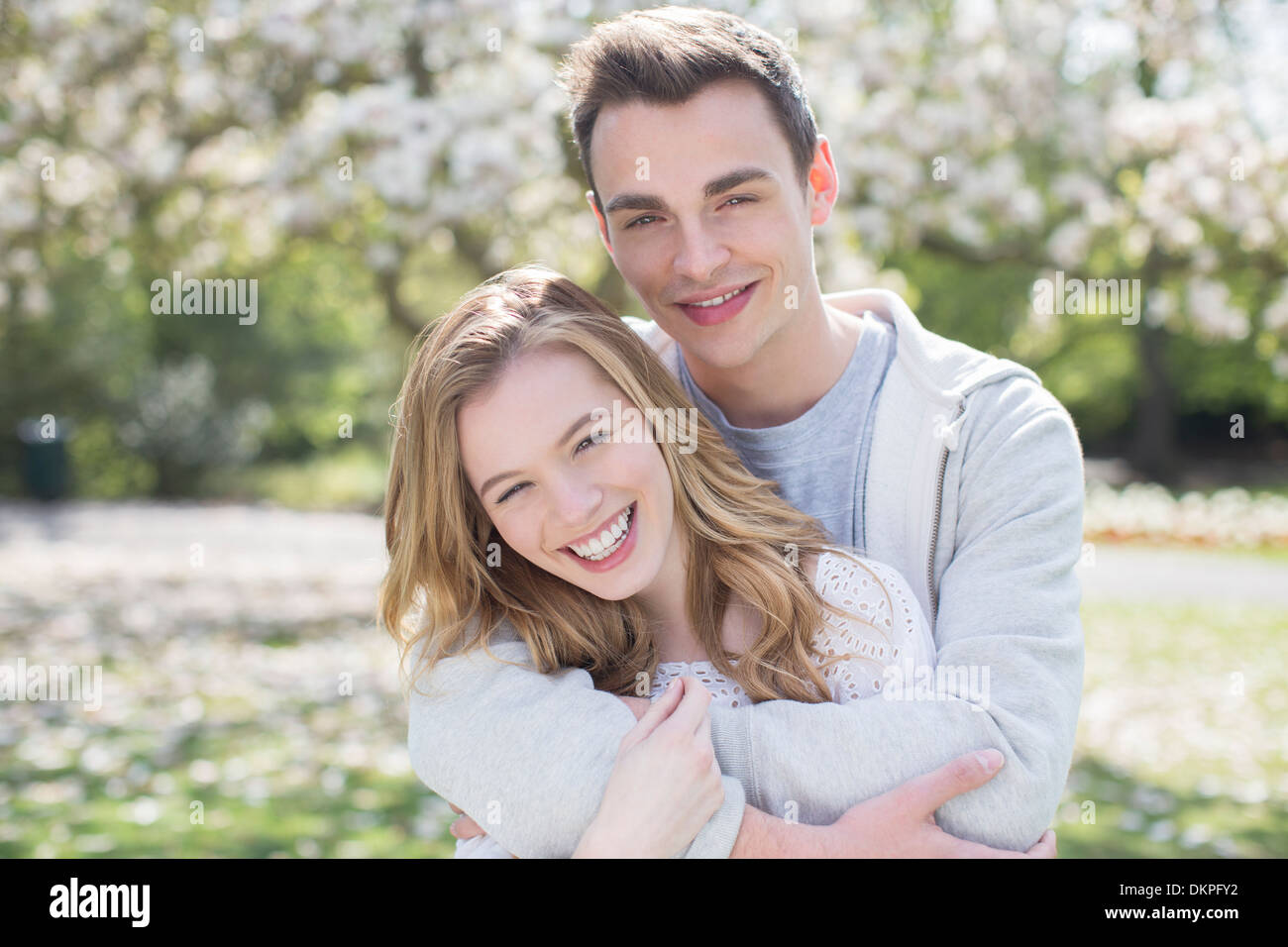 Couple hugging outdoors Stock Photo - Alamy
