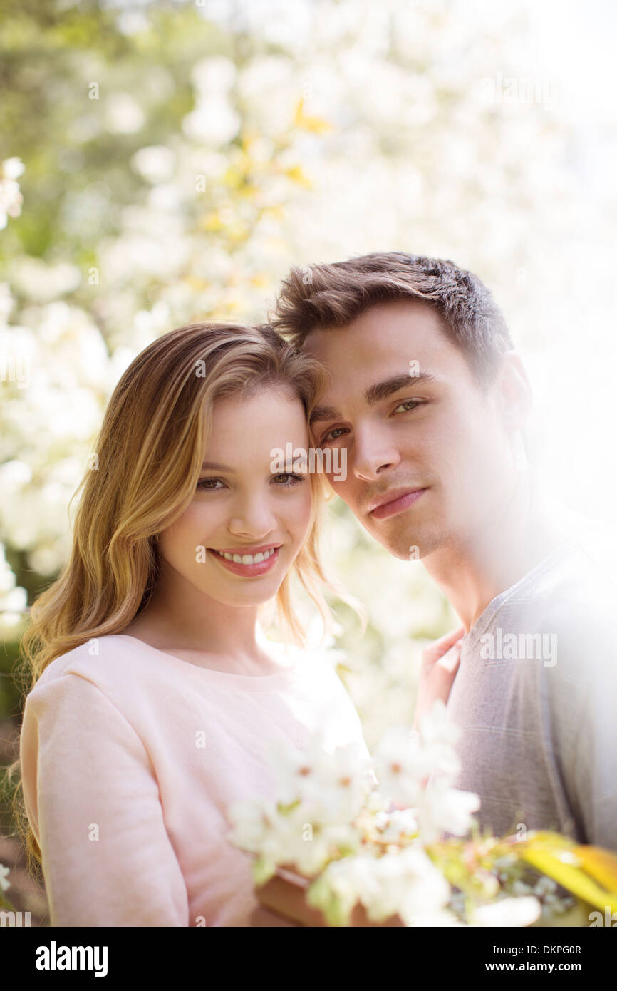 Couple hugging outdoors Stock Photo - Alamy