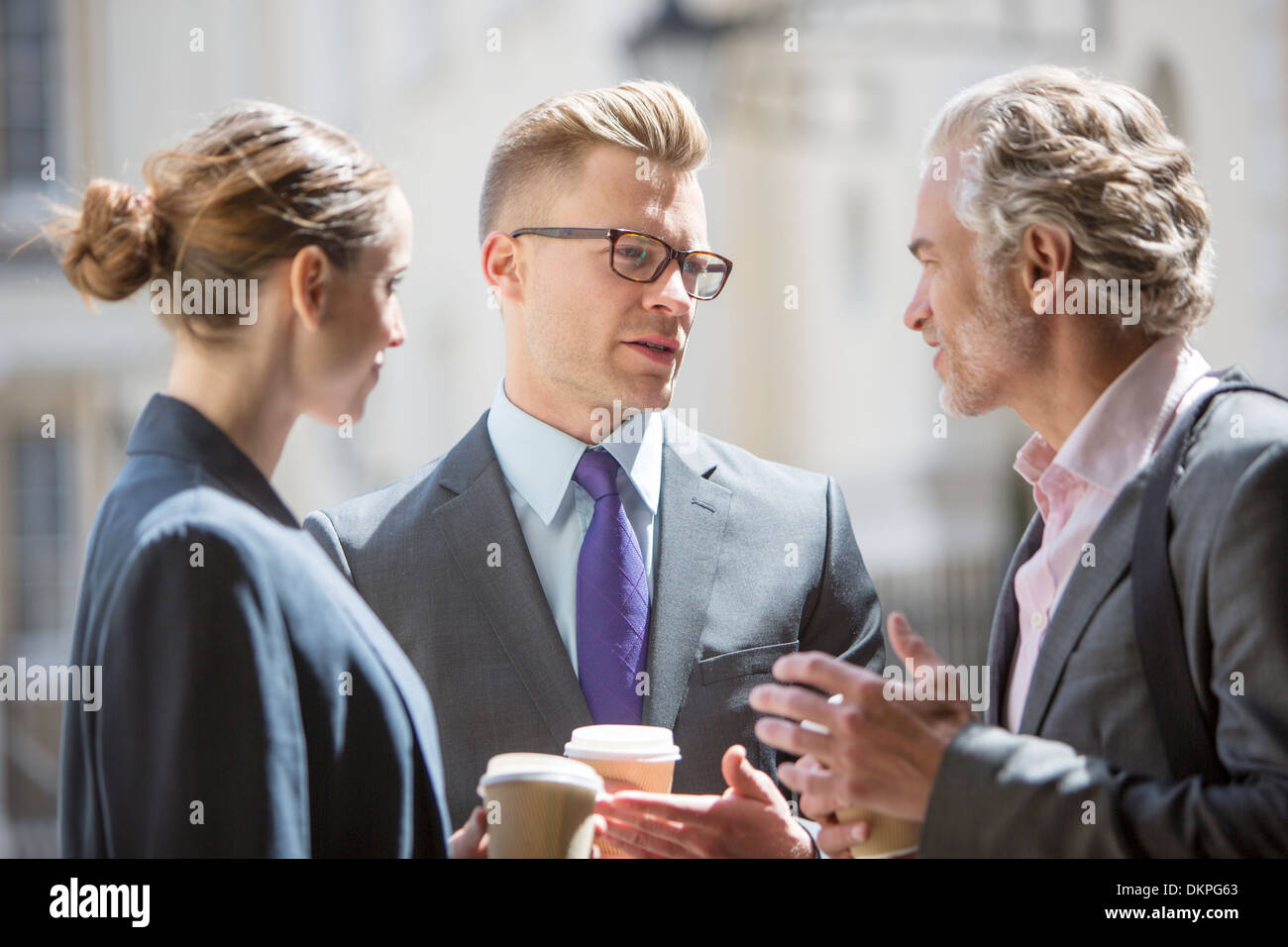 Business people talking close hi-res stock photography and images - Alamy