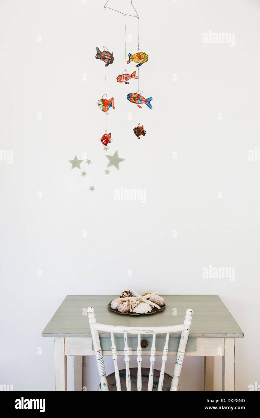 Fish mobile hanging over desk hi-res stock photography and images - Alamy