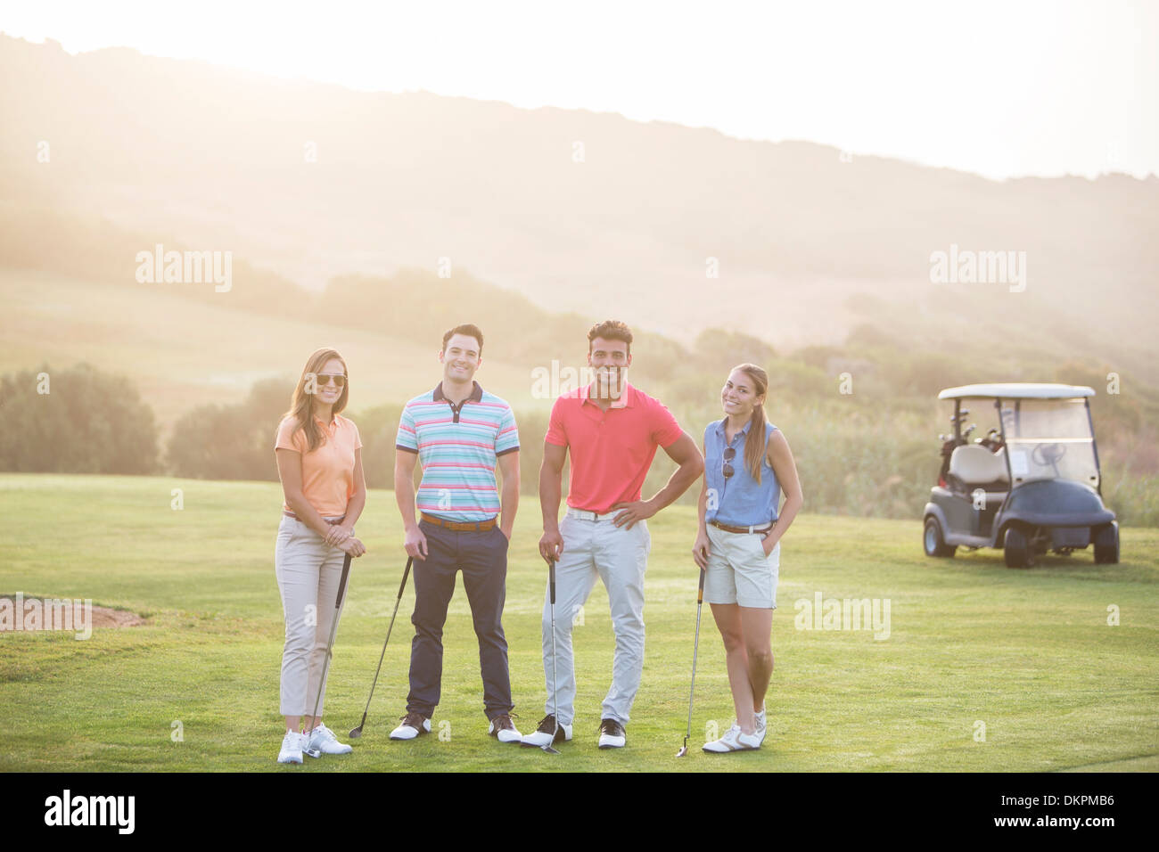 People in golf cart on golf course hi-res stock photography and images ...