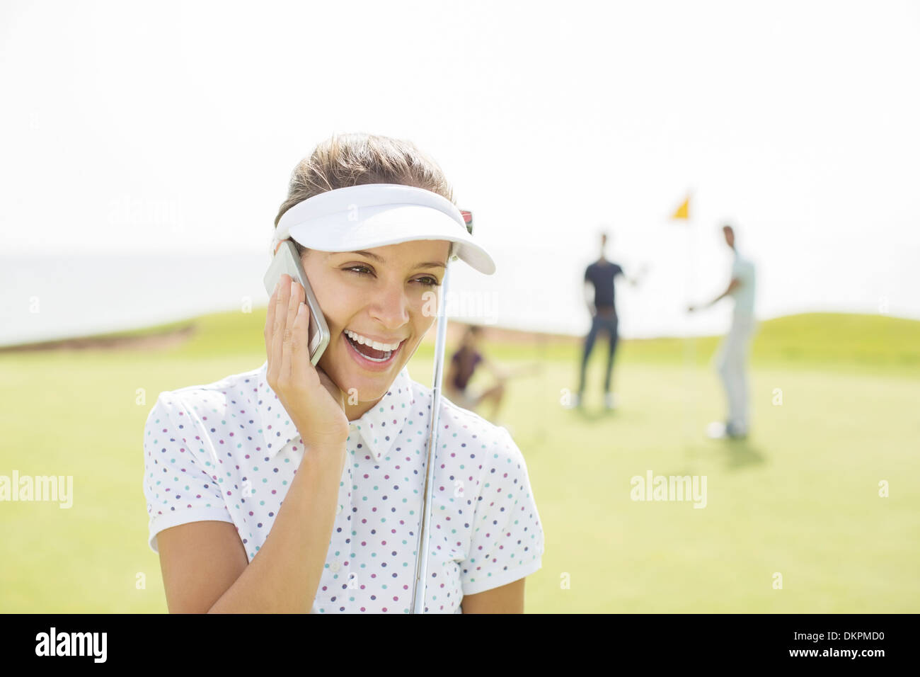 Woman cell phone golf course hi-res stock photography and images - Alamy