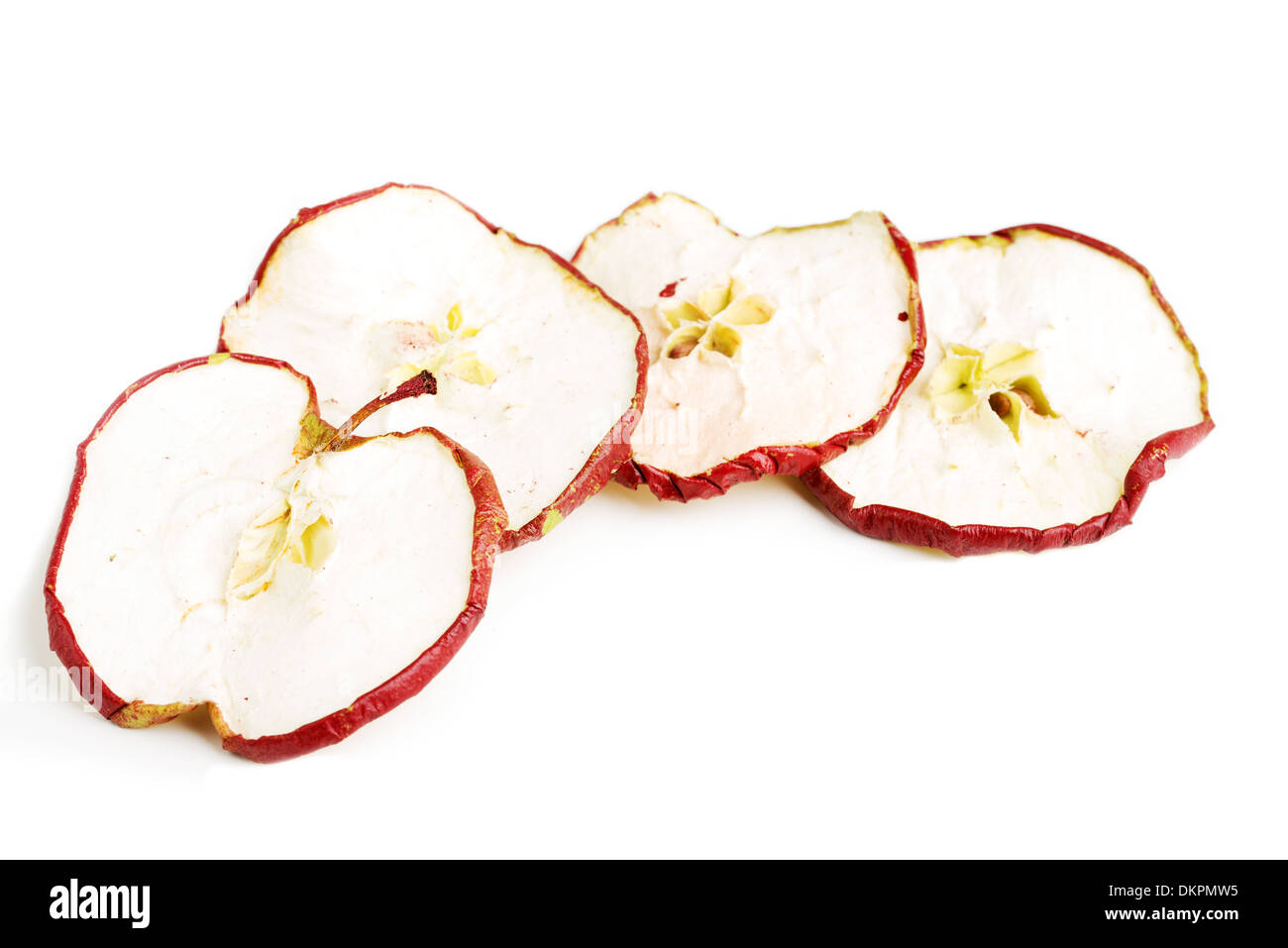 Slices of an apple lying over white background Stock Photo - Alamy