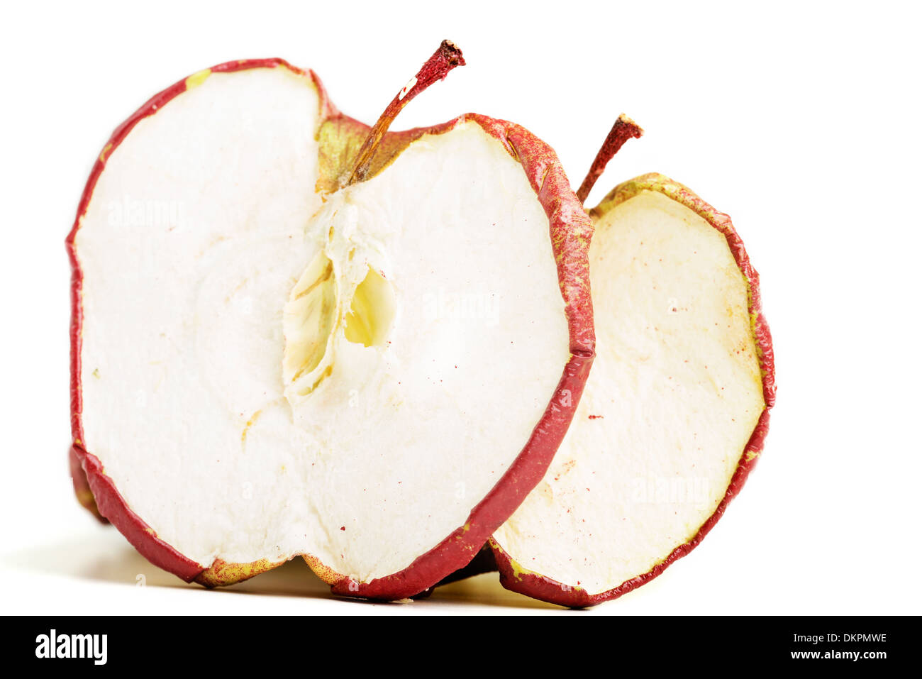 Two pieces of an apple. Isolated on white Stock Photo - Alamy
