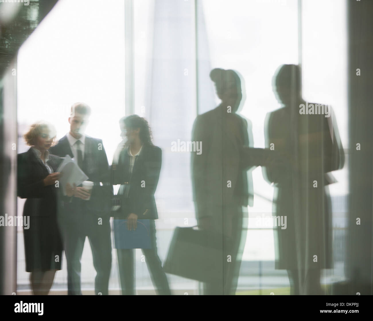 Five people and standing and in shadow hi-res stock photography and ...