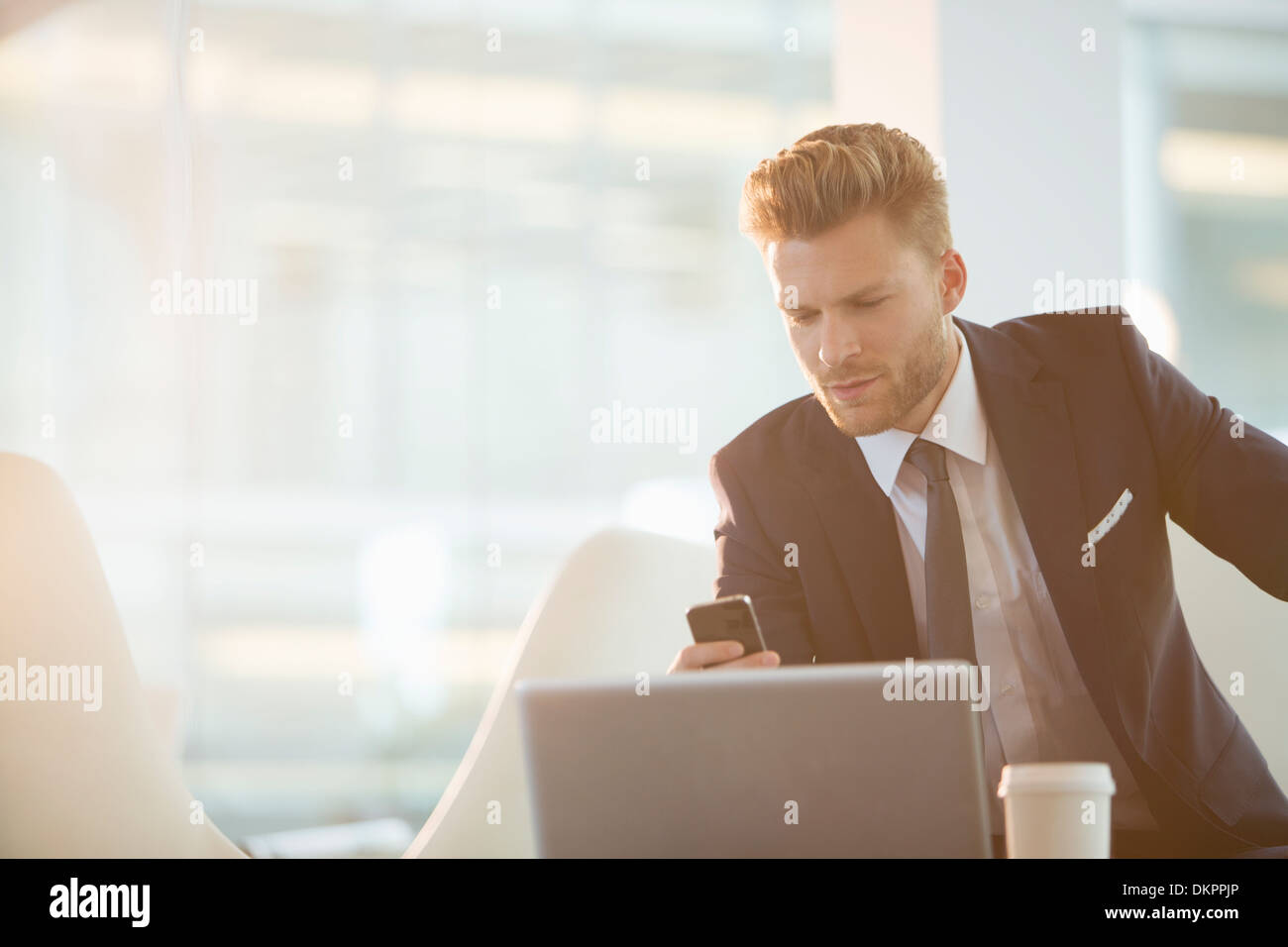 Businessman using cellphone working in hi-res stock photography and ...