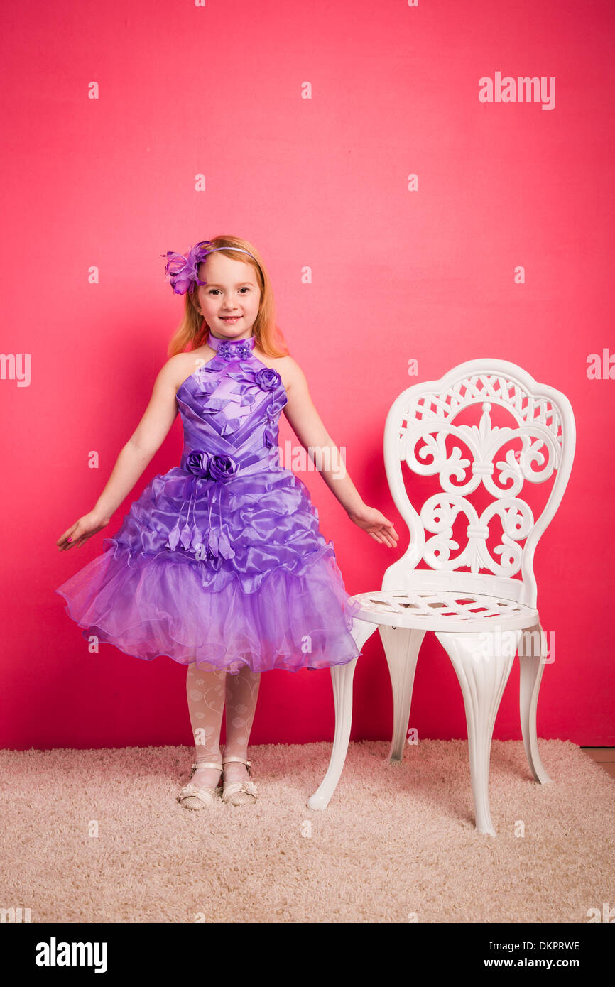 Beautiful girl in a dress posing Stock Photo - Alamy