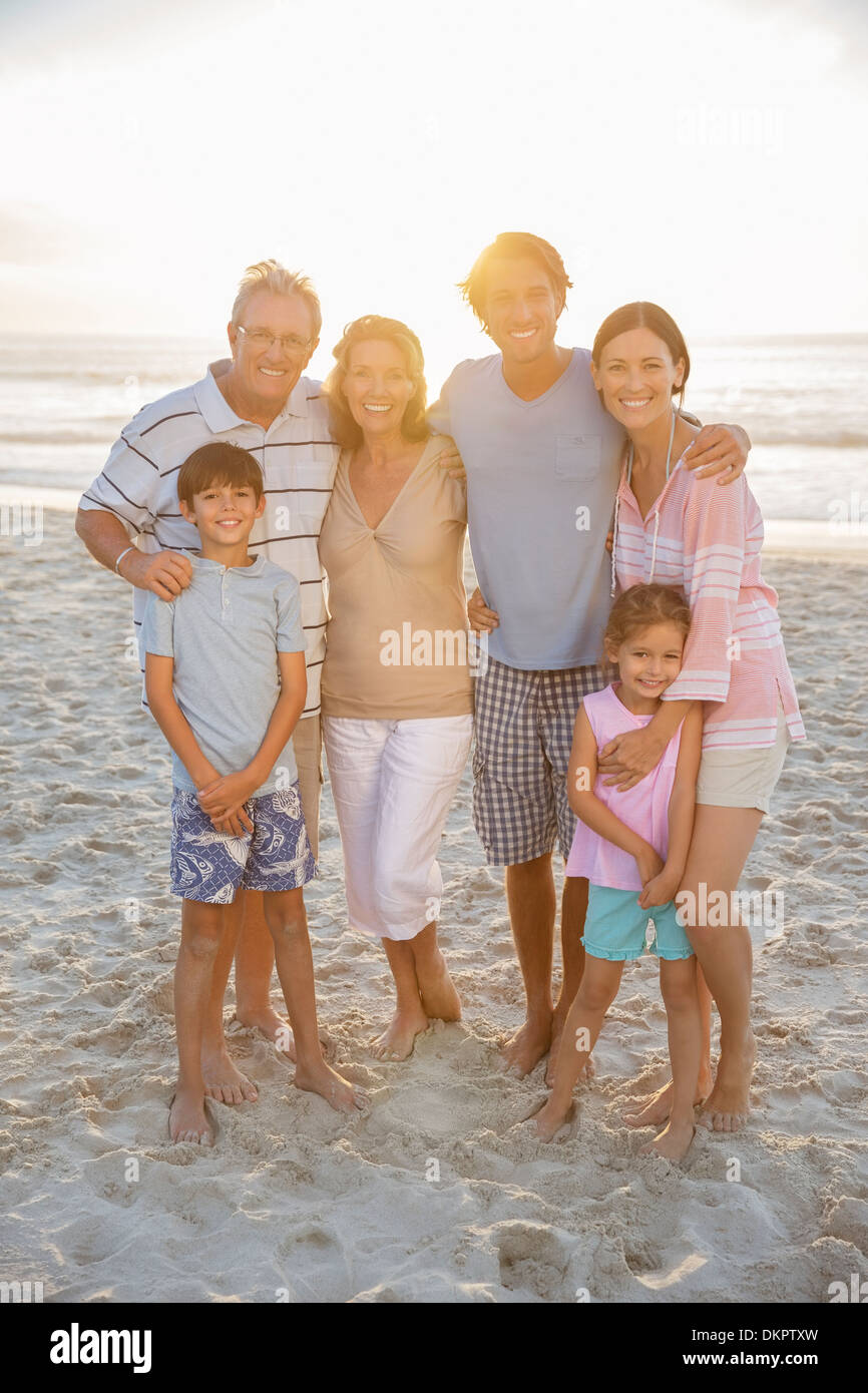 Family on beach at sunset hi-res stock photography and images - Alamy