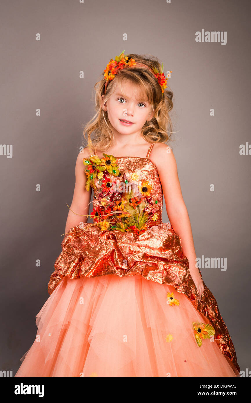 Beautiful girl in a dress, little miss autumn Stock Photo - Alamy