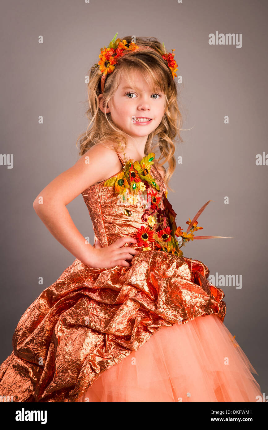 Beautiful girl in a dress, little miss autumn Stock Photo - Alamy