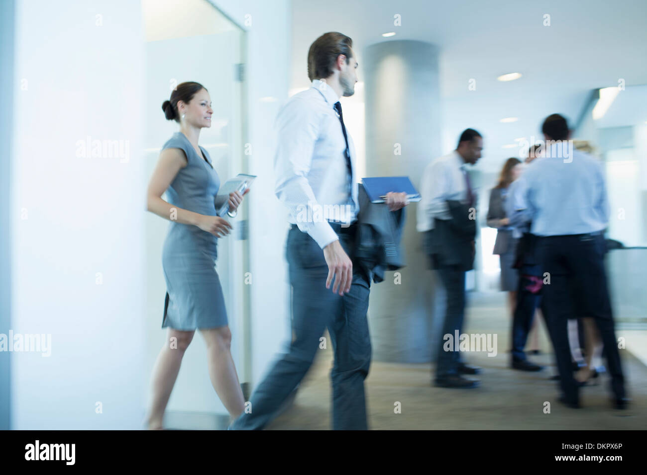 Office worker walking hi-res stock photography and images - Alamy