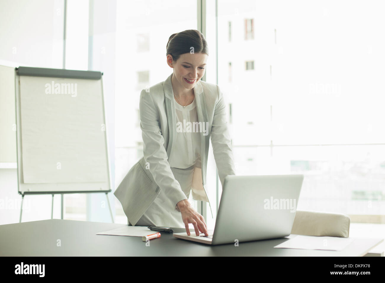 Businesswoman desk using laptop typing hi-res stock photography and ...