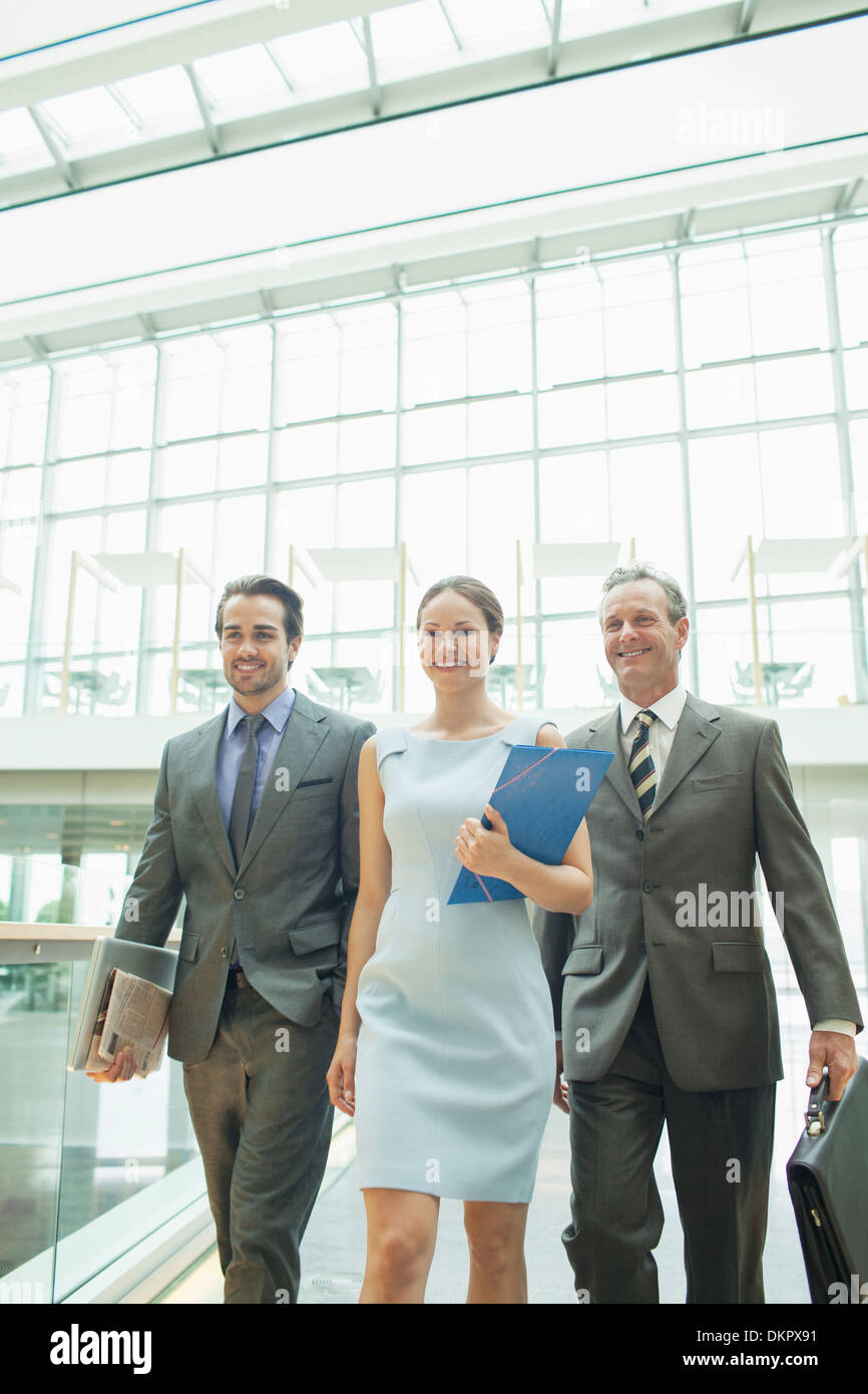 Office worker walking hi-res stock photography and images - Alamy