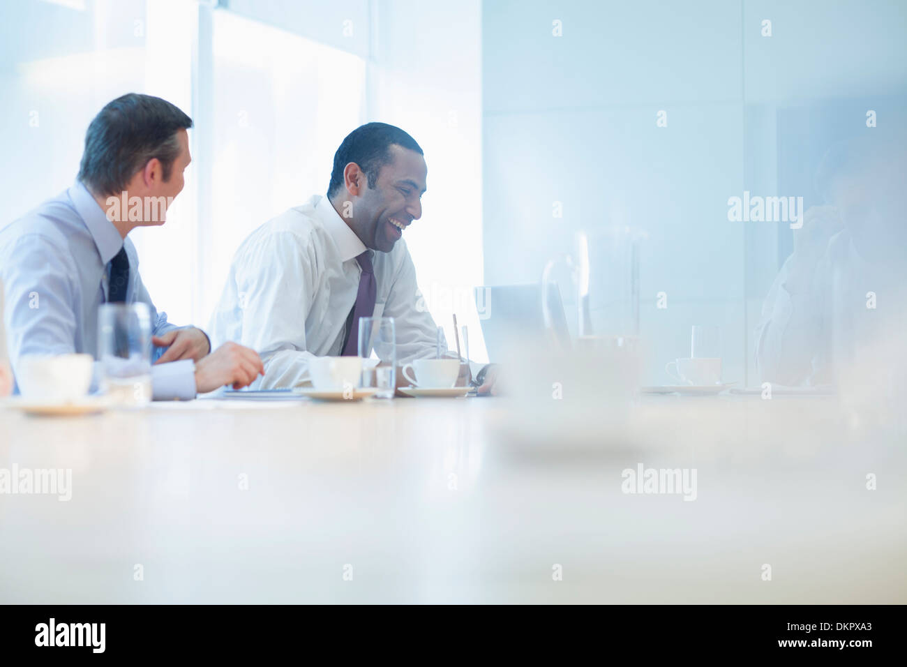 Cheerful mature man laughing talking hi-res stock photography and ...
