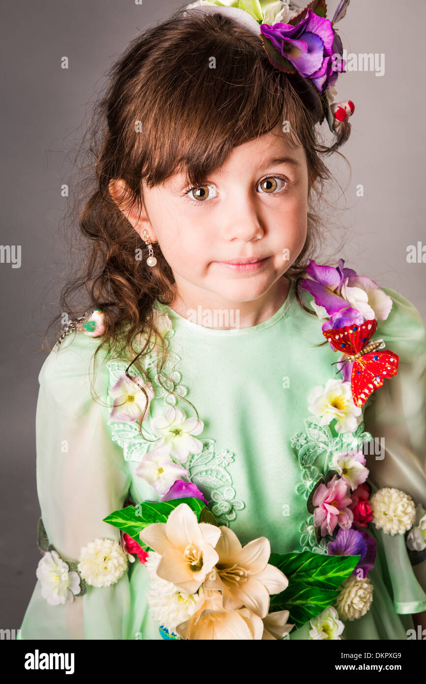 Beautiful girl in a dress posing Stock Photo - Alamy