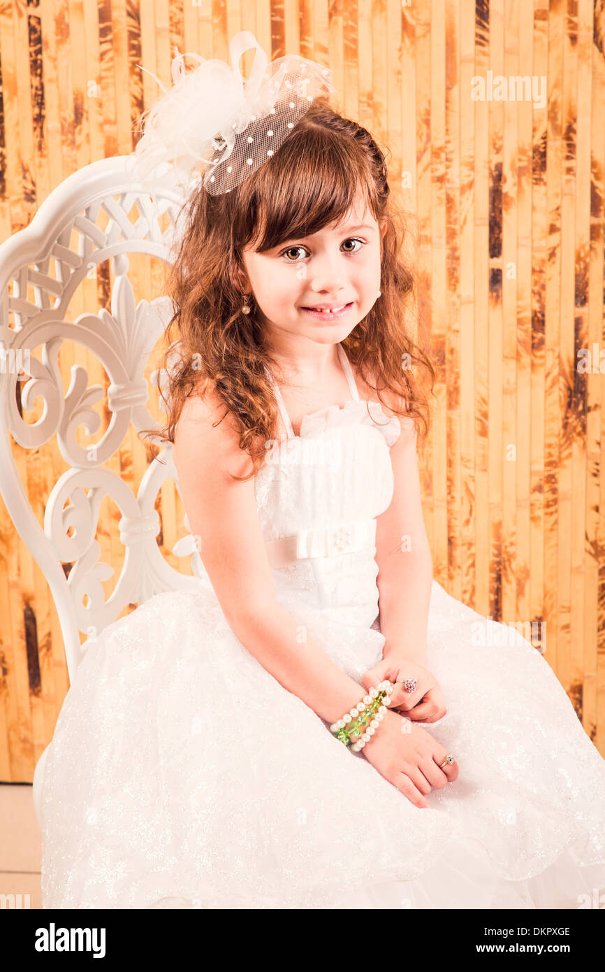 Beautiful girl in a dress posing Stock Photo - Alamy