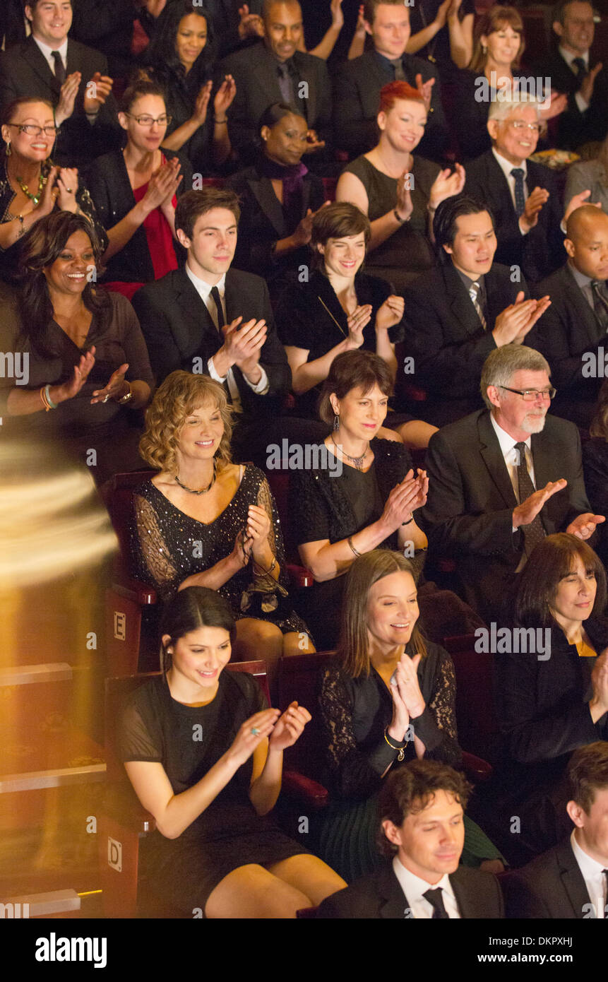 Clapping theater audience Stock Photo - Alamy