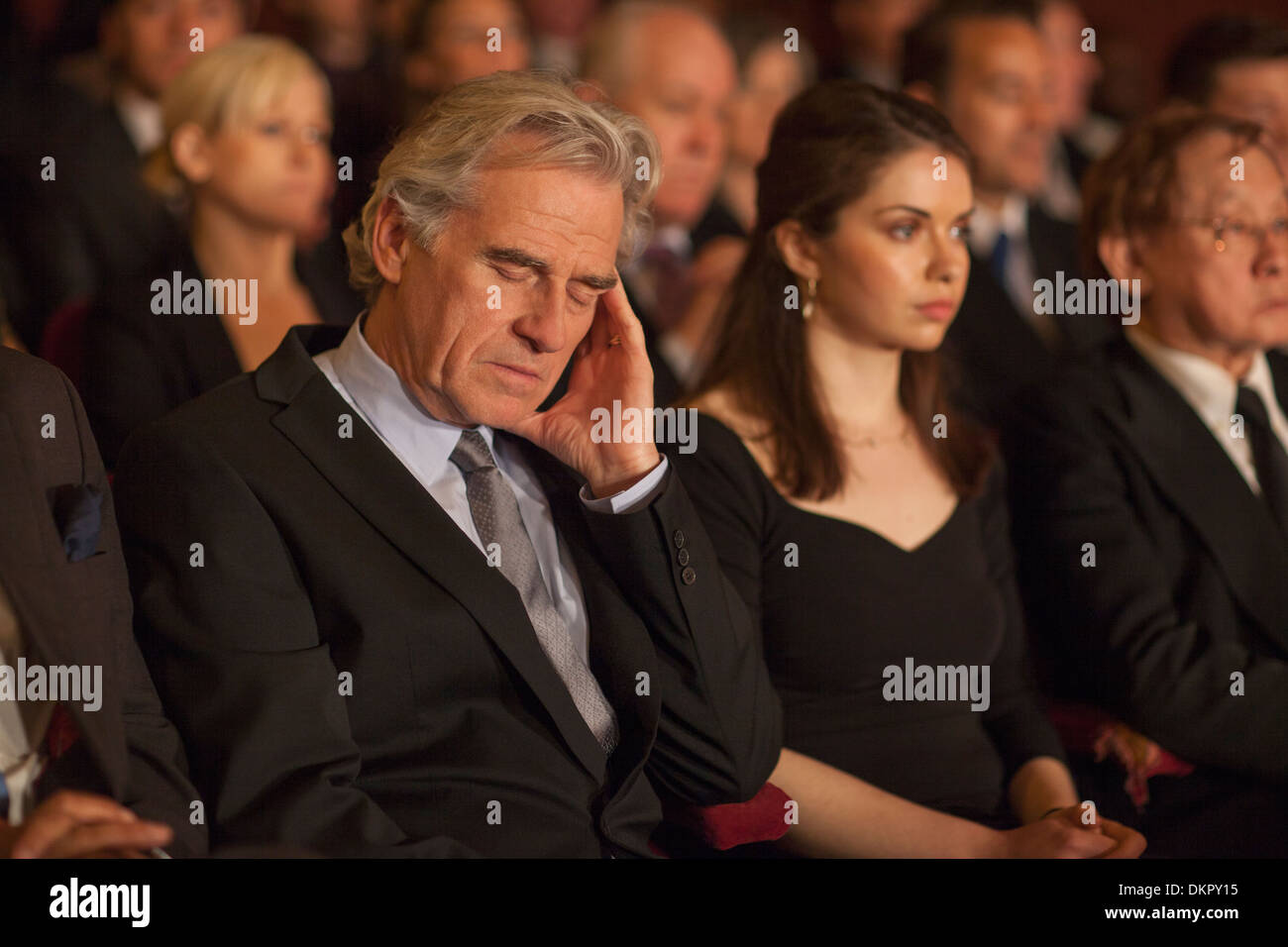 Man sleeping in theater audience Stock Photo - Alamy