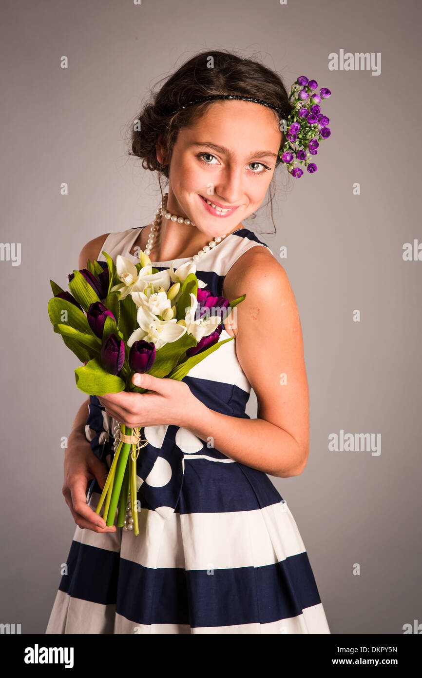 Beautiful girl in a dress posing Stock Photo - Alamy