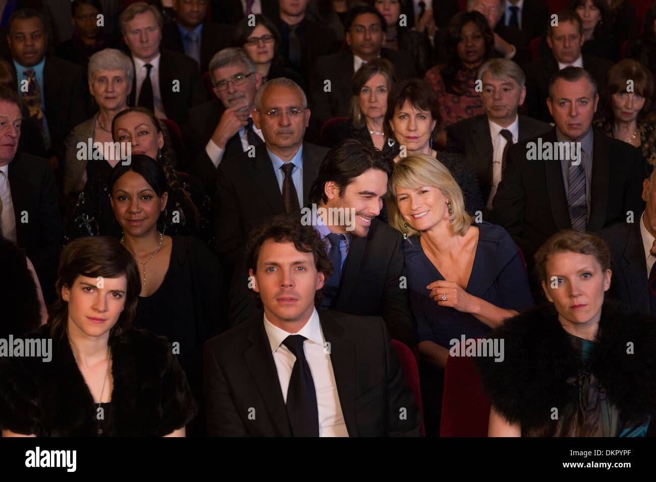 Sitting spectator watching smiling communication hi-res stock ...