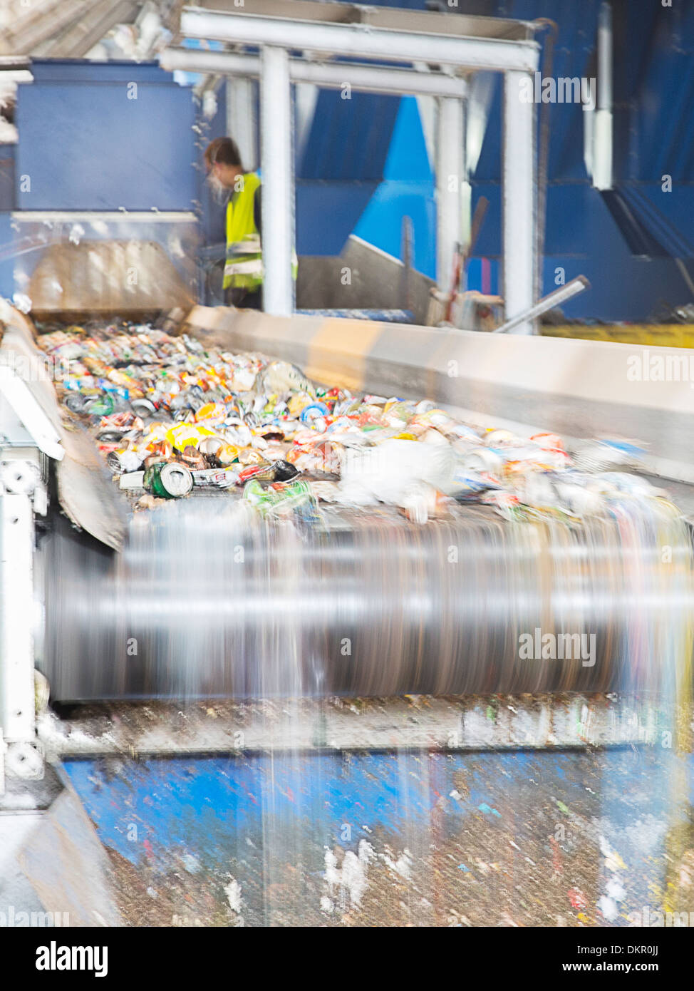 Recycled material on conveyor belt in recycling center Stock Photo - Alamy