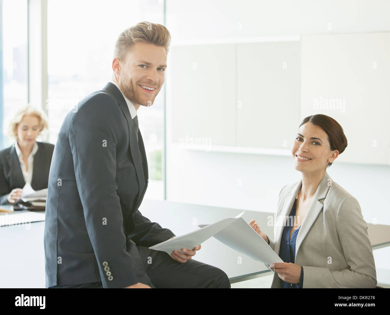 Business people talking in office Stock Photo - Alamy