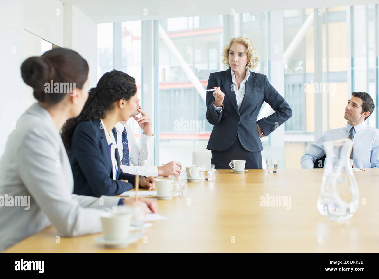 Business people talking in meeting Stock Photo - Alamy