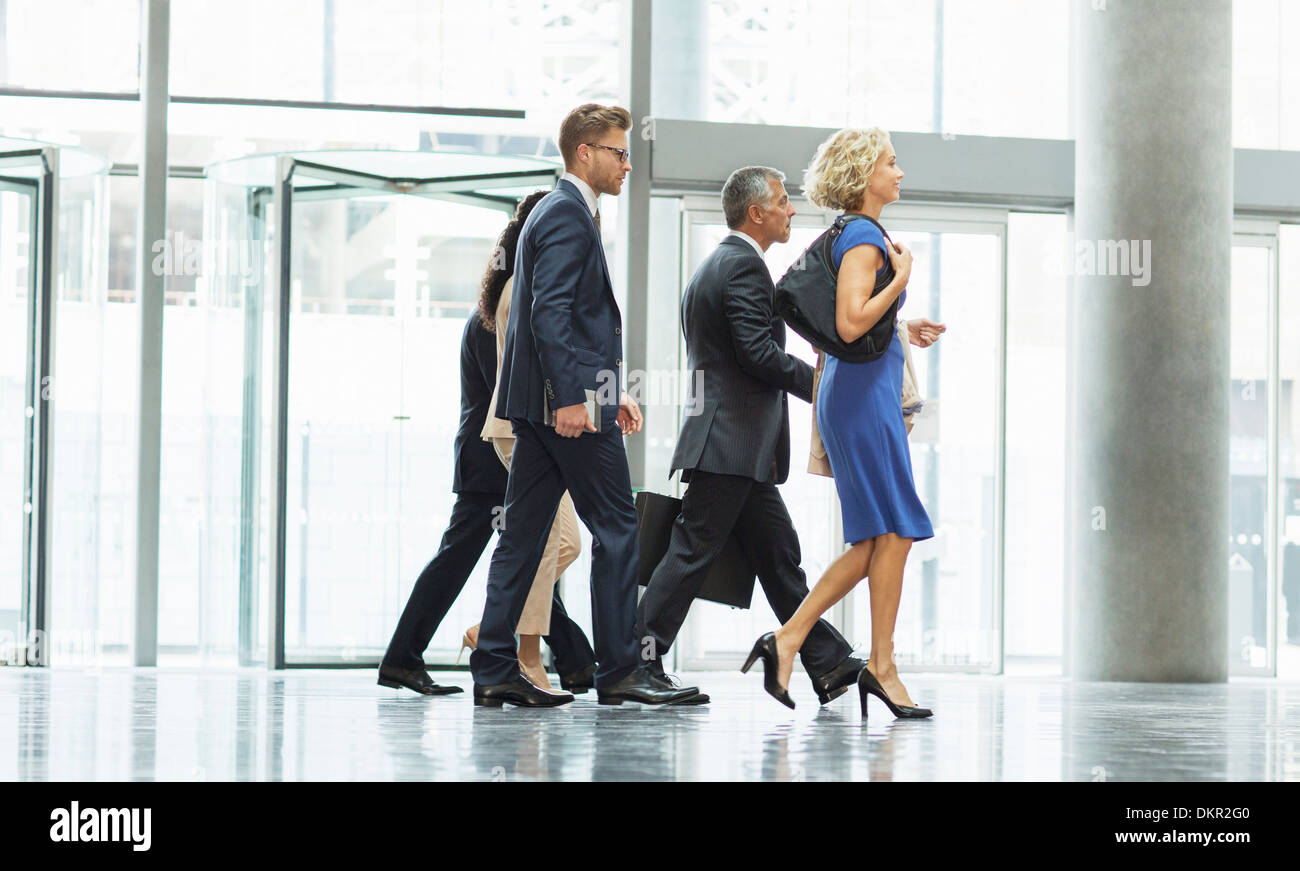 Office worker walking hi-res stock photography and images - Alamy