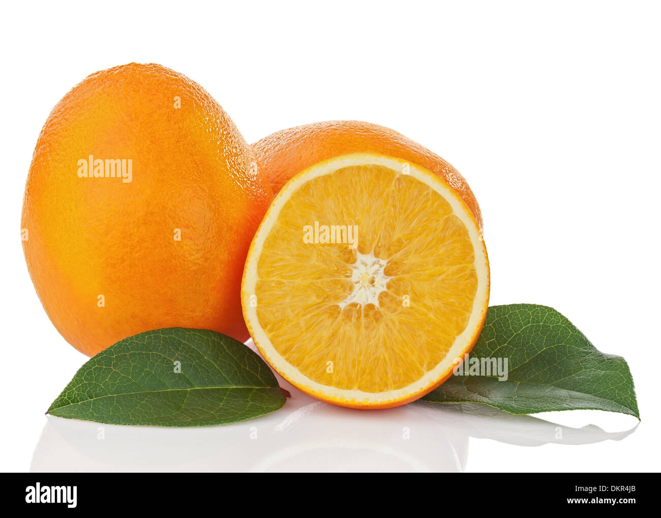 Fresh orange fruit with green leaves isolated on white background ...