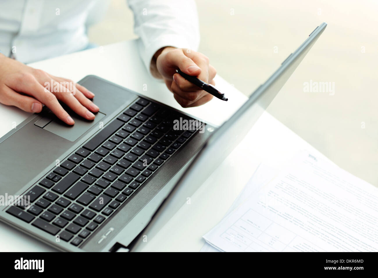 Pointing at laptop hi-res stock photography and images - Alamy