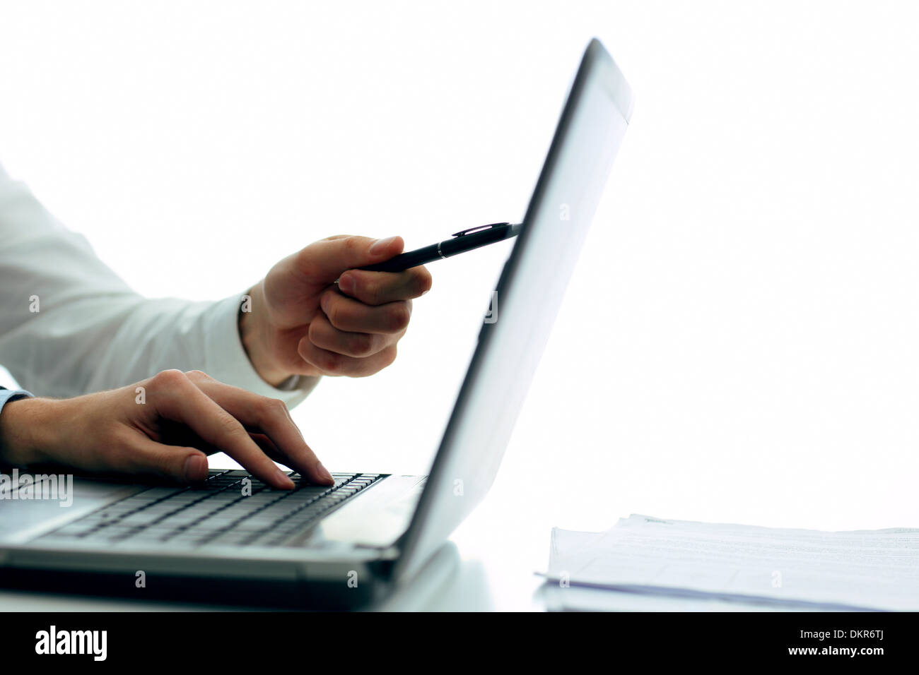 Businessman pointing at laptop hi-res stock photography and images - Alamy