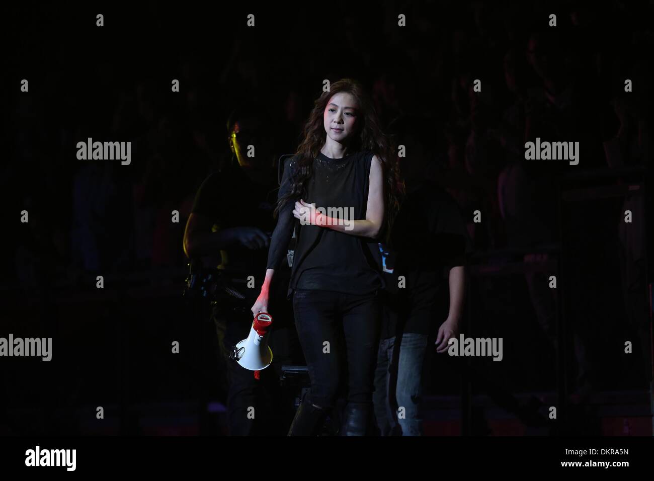 Taipei, China. 8th Dec, 2013. Singer Cheer Chan performs at her concert ...