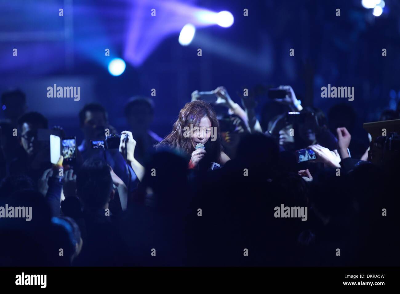 Taipei, China. 8th Dec, 2013. Singer Cheer Chan performs at her concert ...