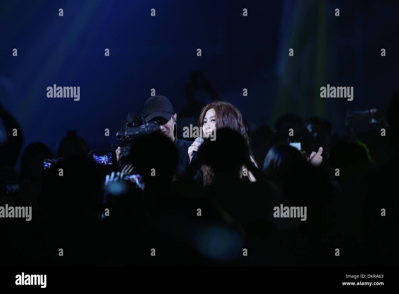 Taipei, China. 8th Dec, 2013. Singer Cheer Chan performs at her concert ...