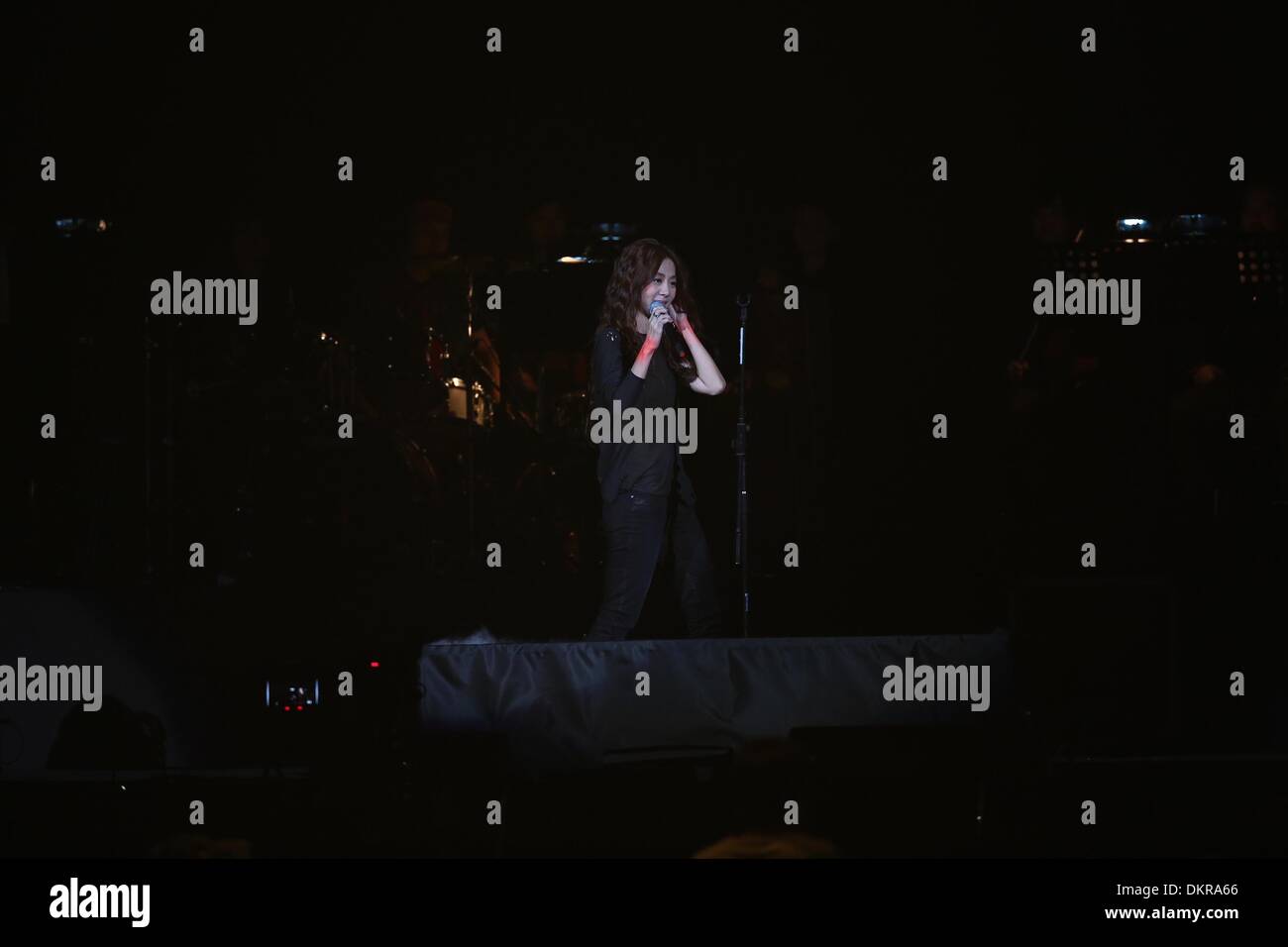 Taipei, China. 8th Dec, 2013. Singer Cheer Chan performs at her concert ...