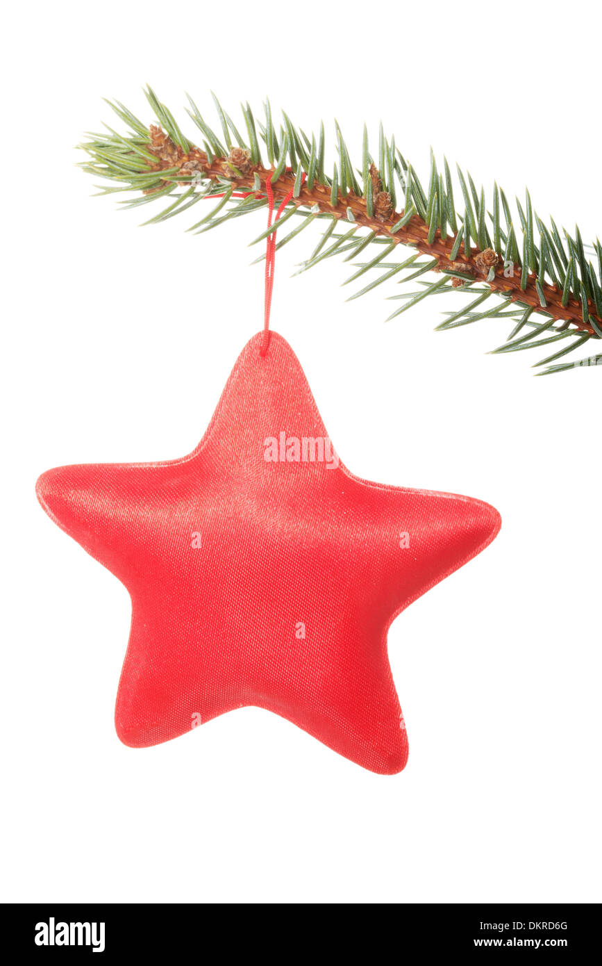 red star hanging on a christmas tree Stock Photo - Alamy