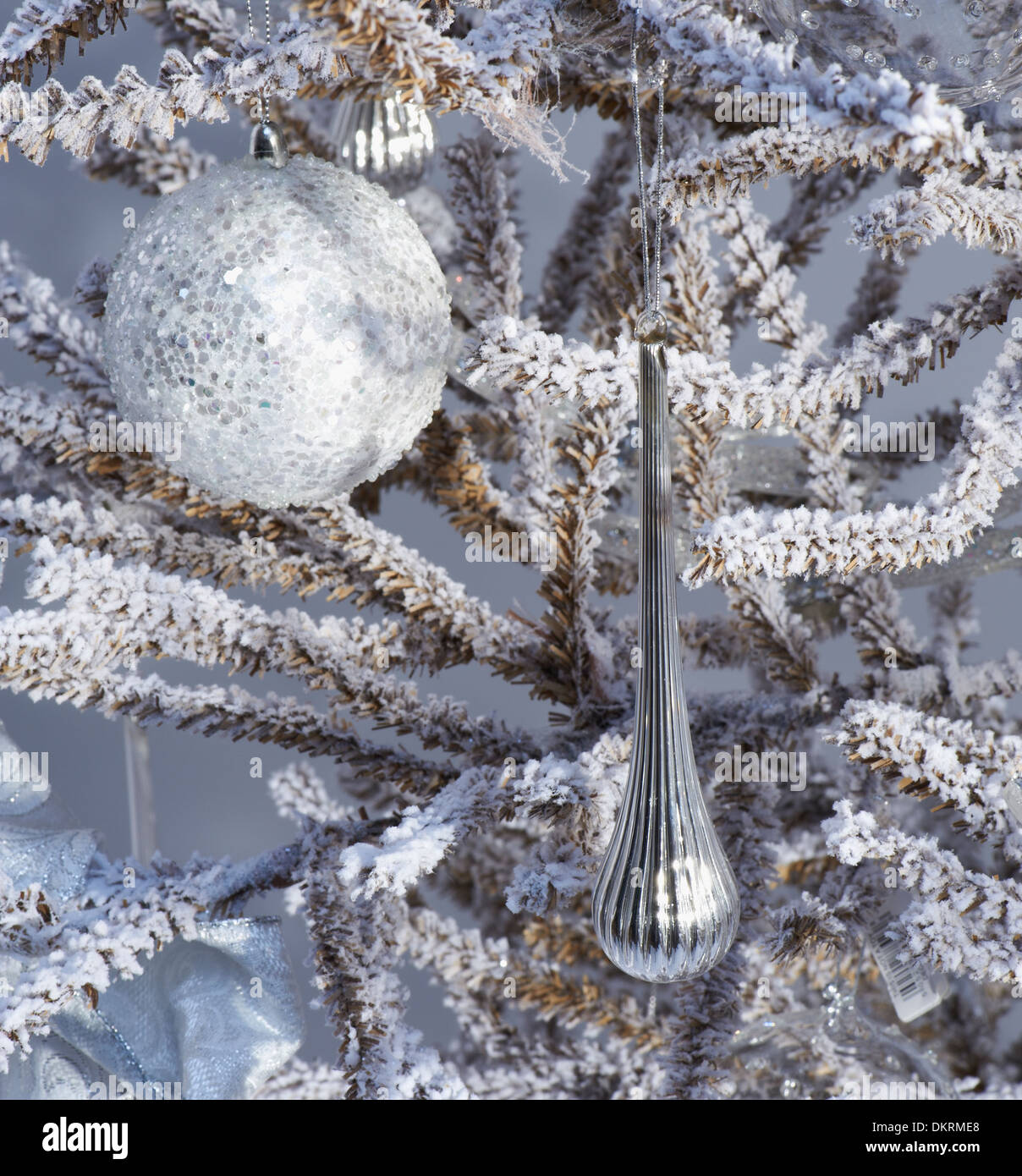 Christmas Tree with snow and decorations Stock Photo - Alamy