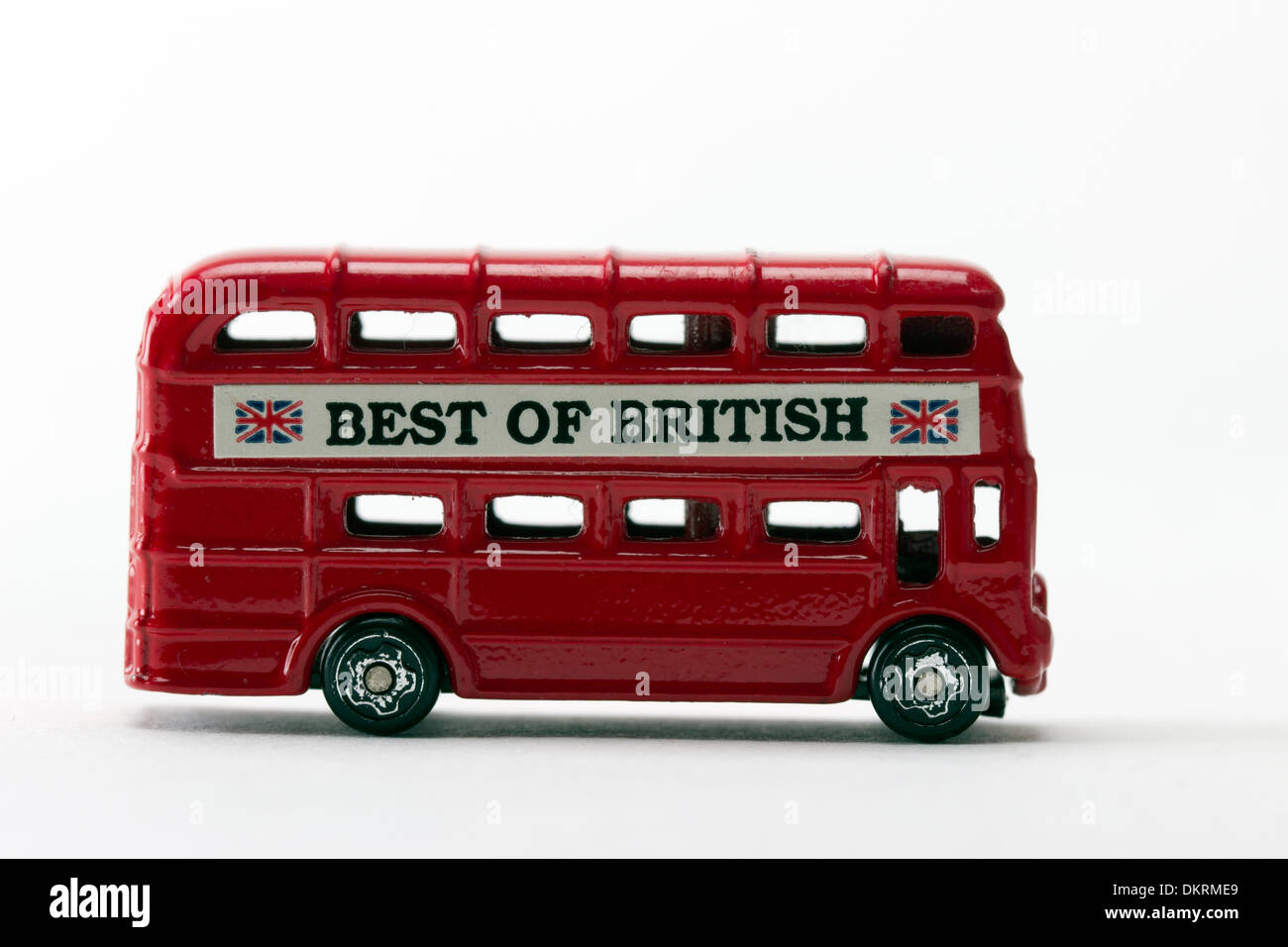 Best of British Toy red bus on white background Stock Photo - Alamy