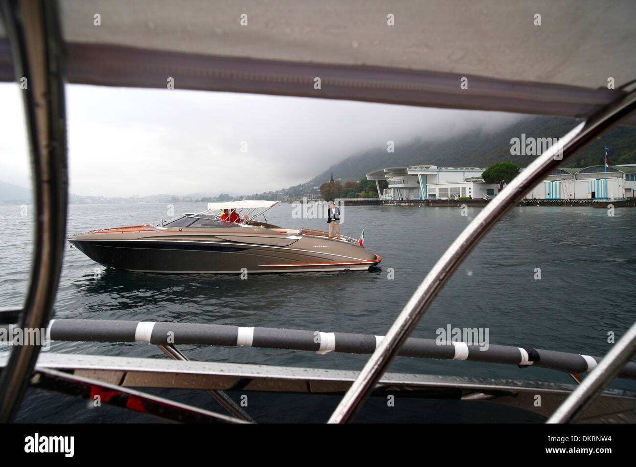 A Rivarama super yacht near the Riva factory on a misty Lake Iseo in ...