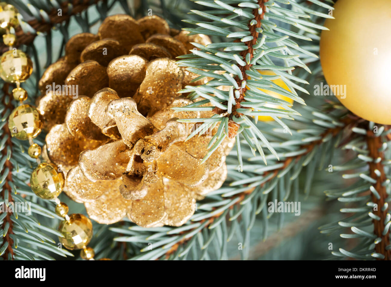 Christmas decorations- pine, balls on a tree. Over green background ...