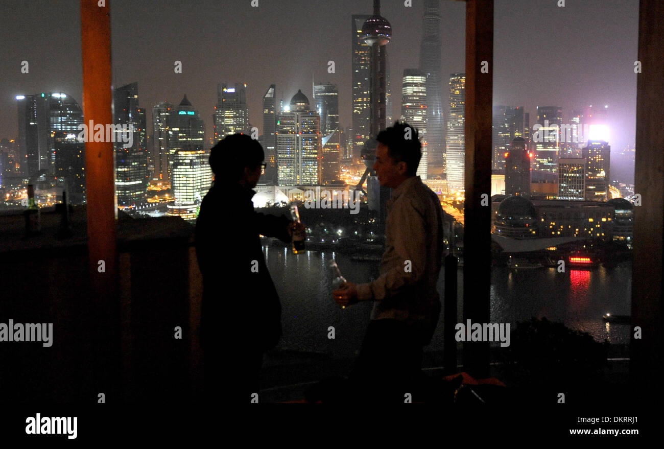 Shanghai, China. 18th Nov, 2013. Visitors sit at the whirl pool of a ...