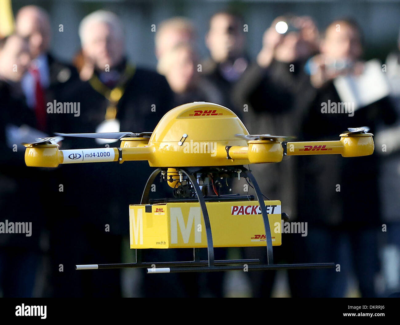 Bonn, Germany. 09th Dec, 2013. An unmanned aerial vehicle (UAV) lands ...